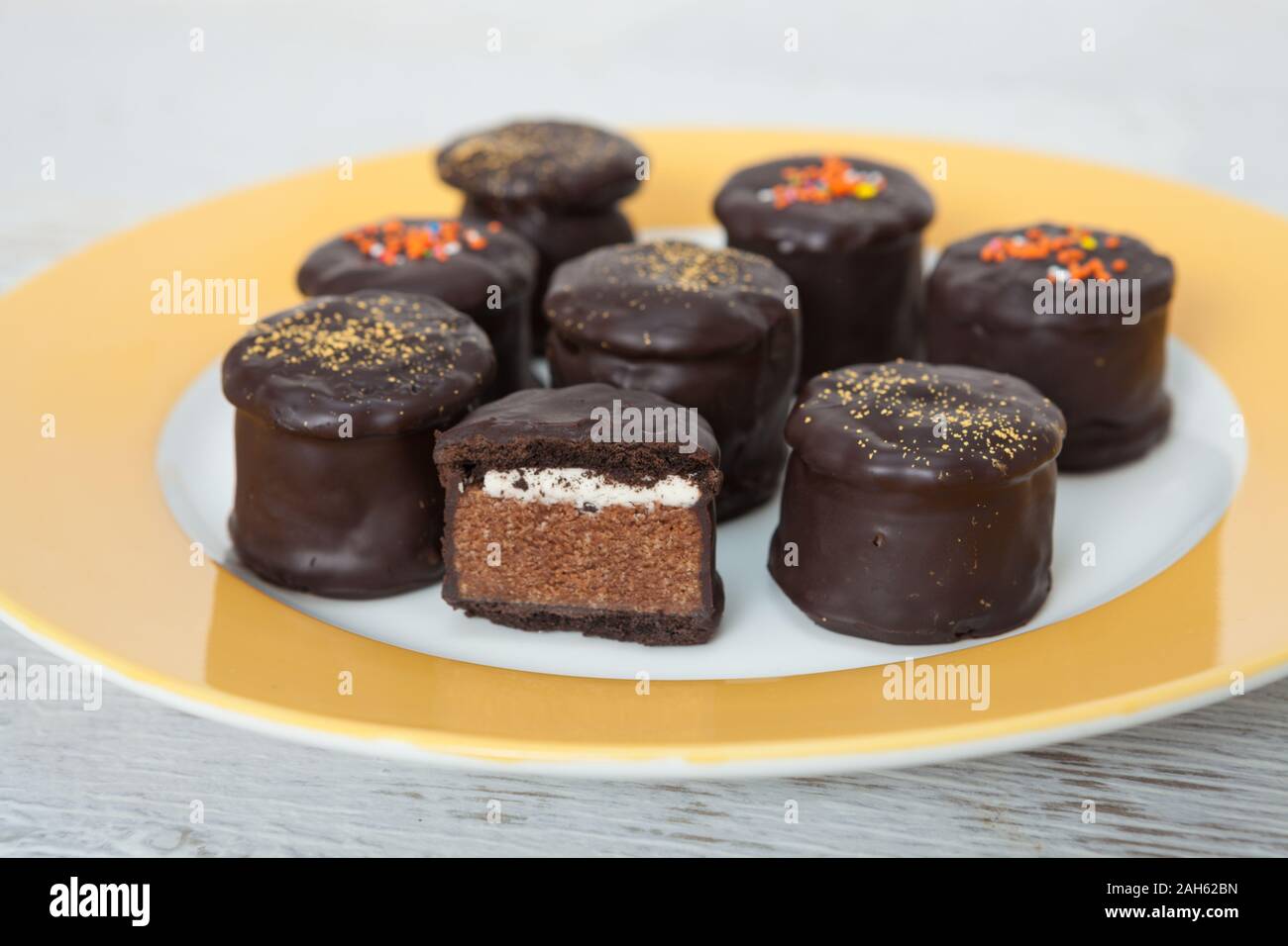 Chocolate candy with topping Stock Photo - Alamy