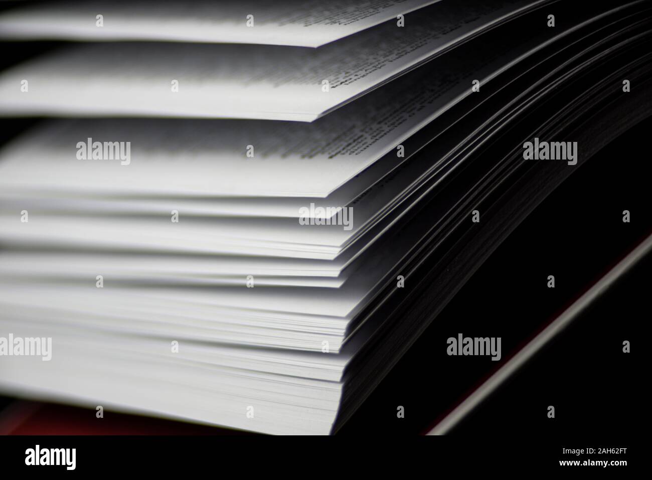 open book close up in a corner Stock Photo - Alamy