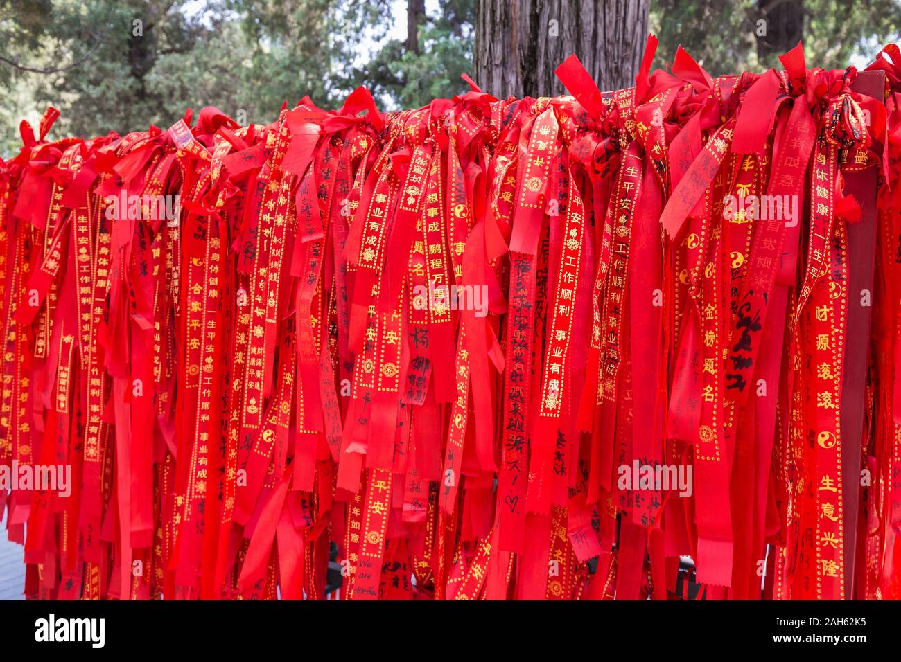 Beijing, China - May 22, 2016: Many red ribbons with Chinese characters ...