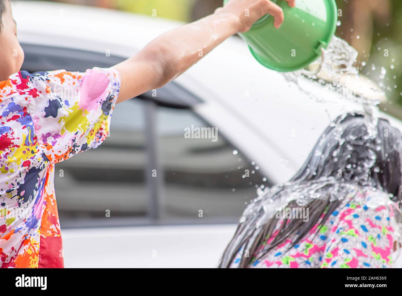 Hand holding Plastic bucket play Songkran festival or Thai new year in ...