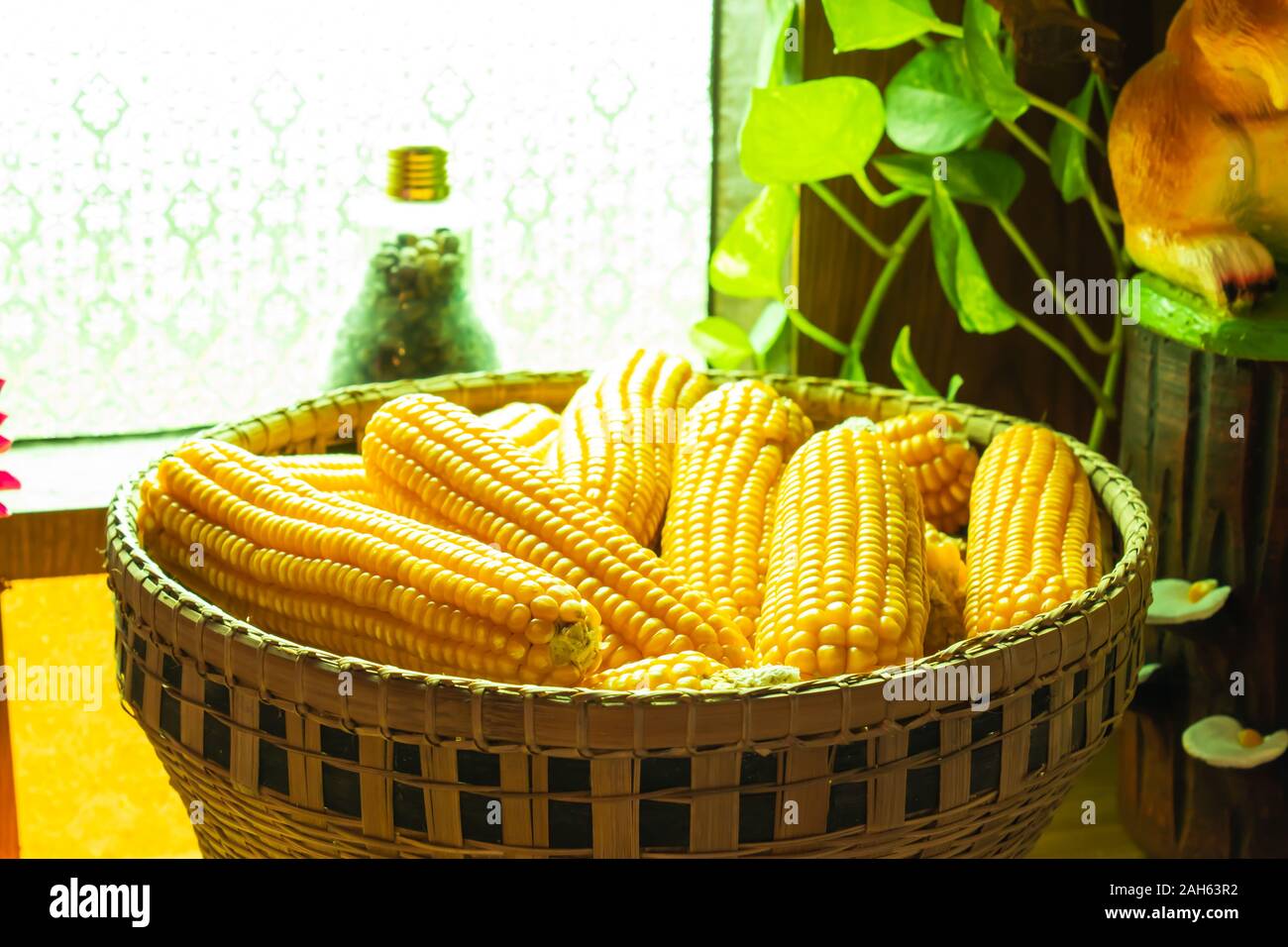 Ripe corn in basket hi-res stock photography and images - Alamy