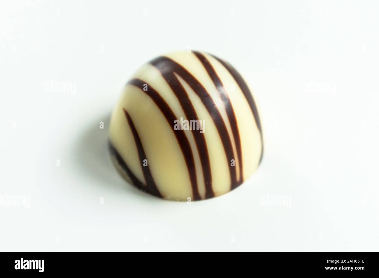 White chocolate candy isolated on a white background Stock Photo - Alamy