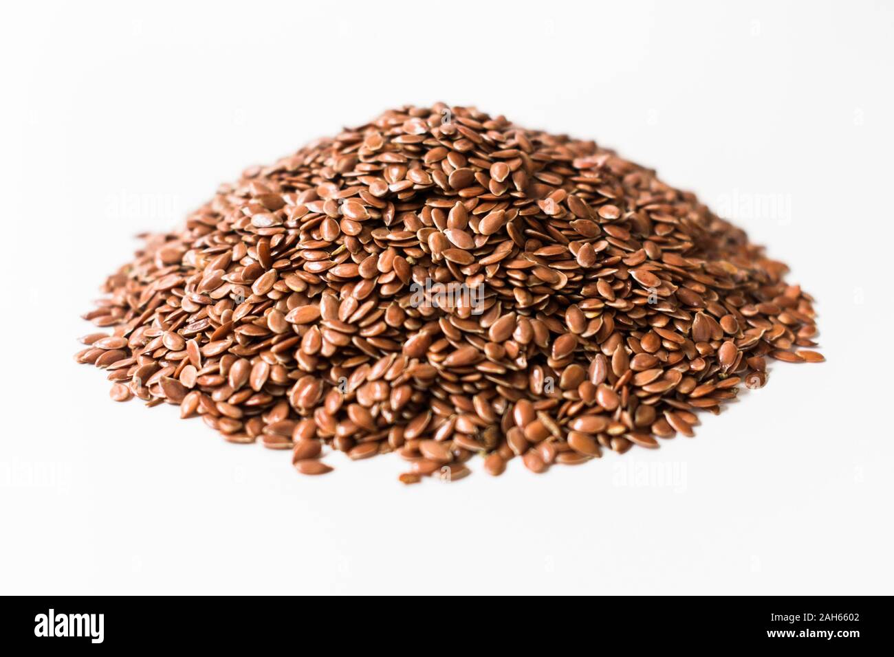 Flax seeds isolated on a white background.Close-up Stock Photo - Alamy