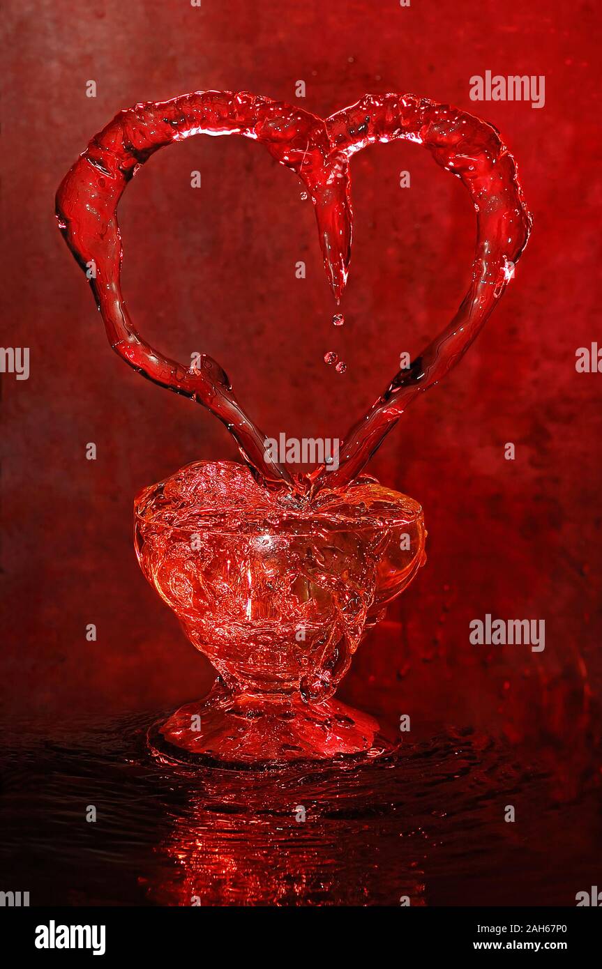 Heart-shape jet in the glass Stock Photo - Alamy