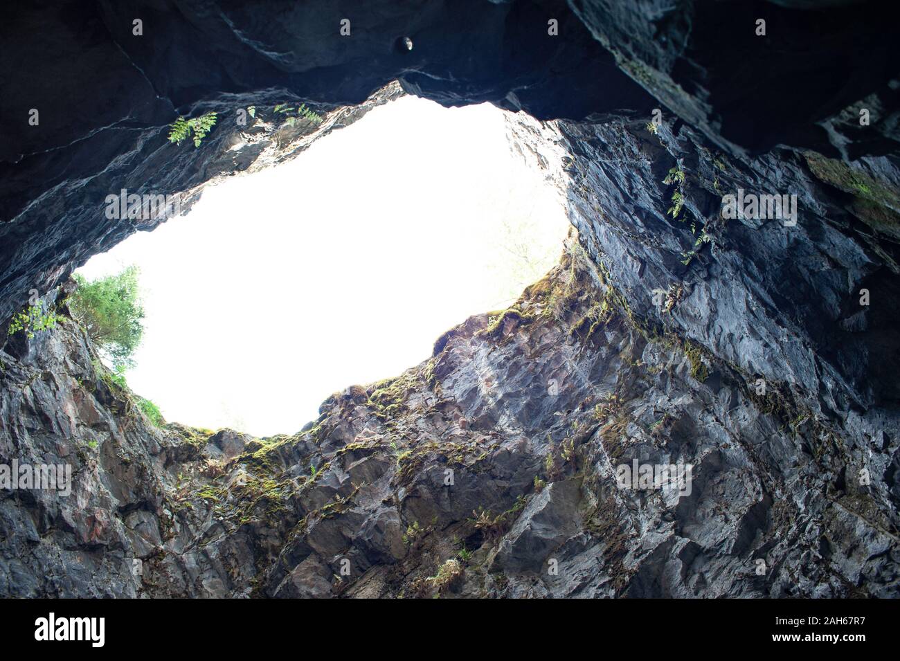 Hole in the rocky cave inside from bottom to top upwards Stock Photo ...
