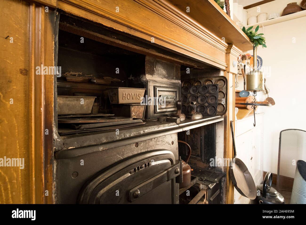 Old fashioned baking tins and oven Stock Photo - Alamy