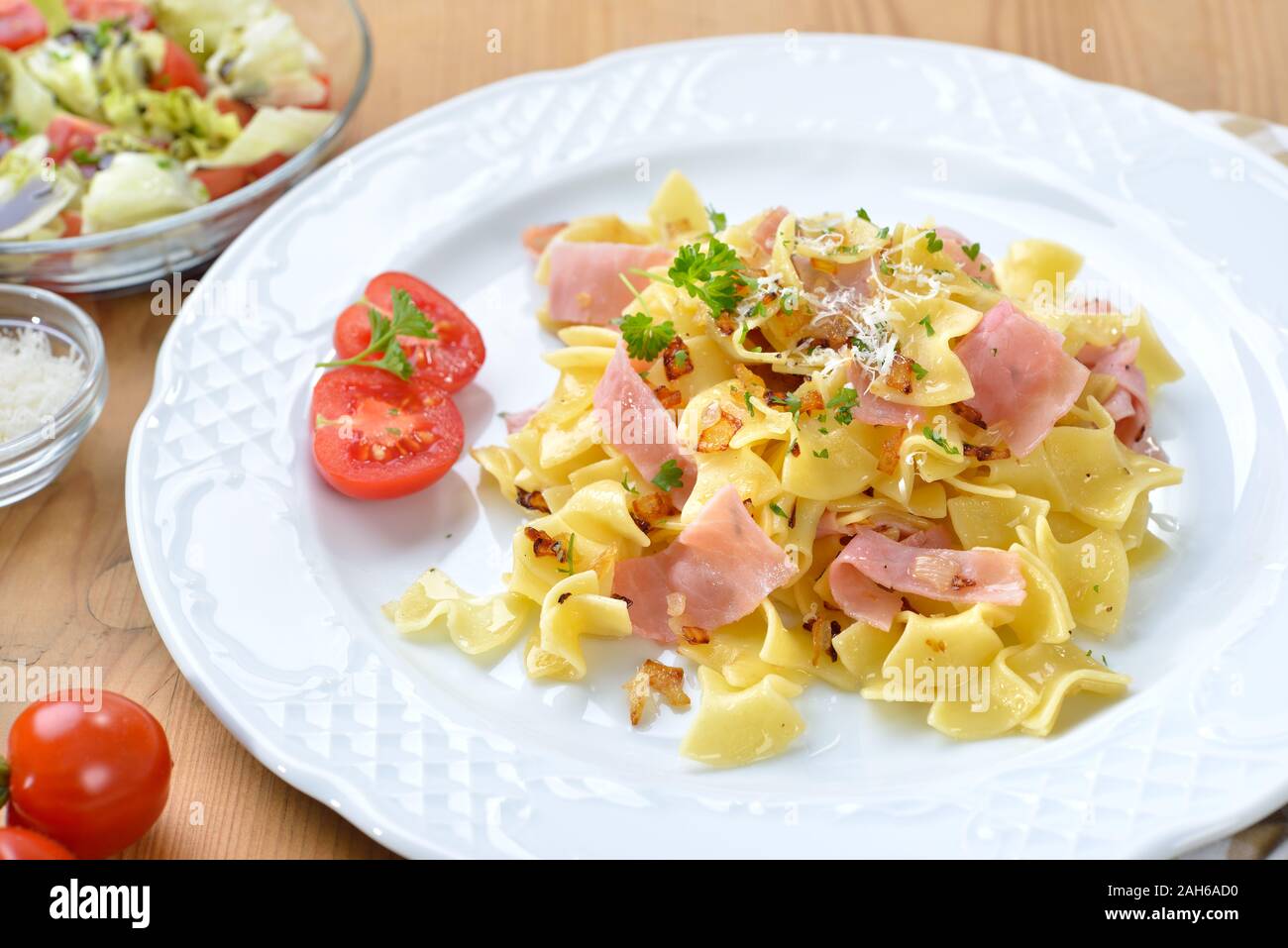 Austrian ham pasta, so called Schinkenfleckerl, and a side salad with ...