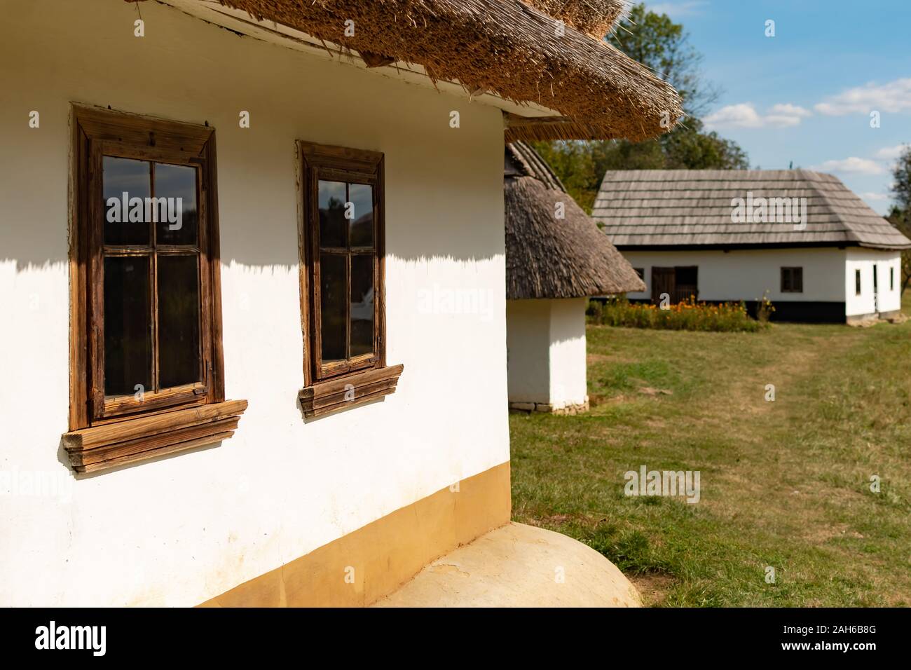 Old traditional architecture with typical wooden huts and mills in ...
