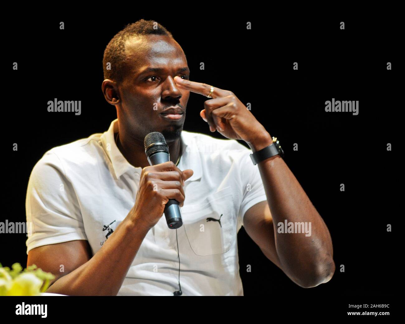 Jamaican athletics legend Usain Bolt during a public interview Stock ...