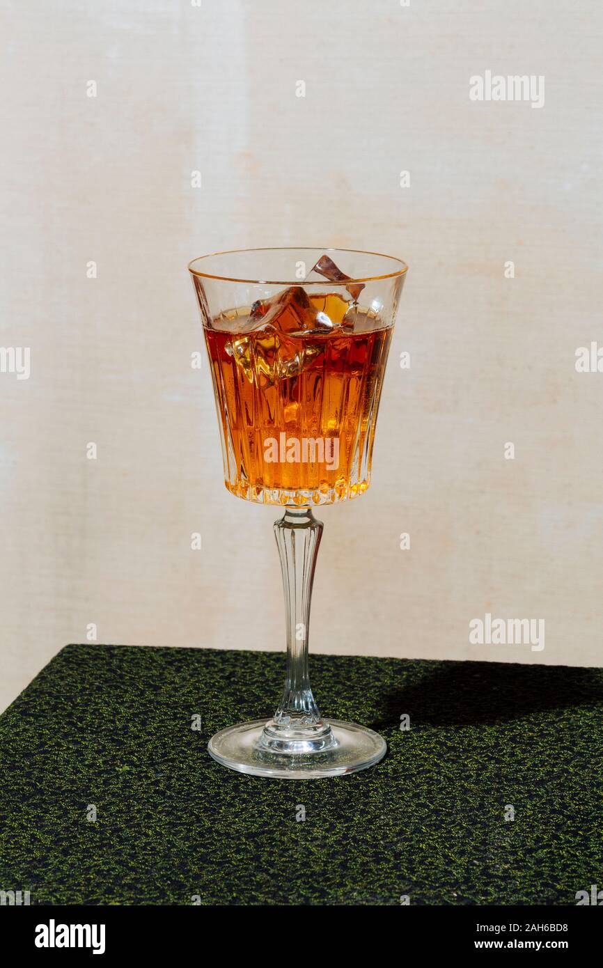 Bitter, ice and charred orange, an italian aperitif Stock Photo - Alamy