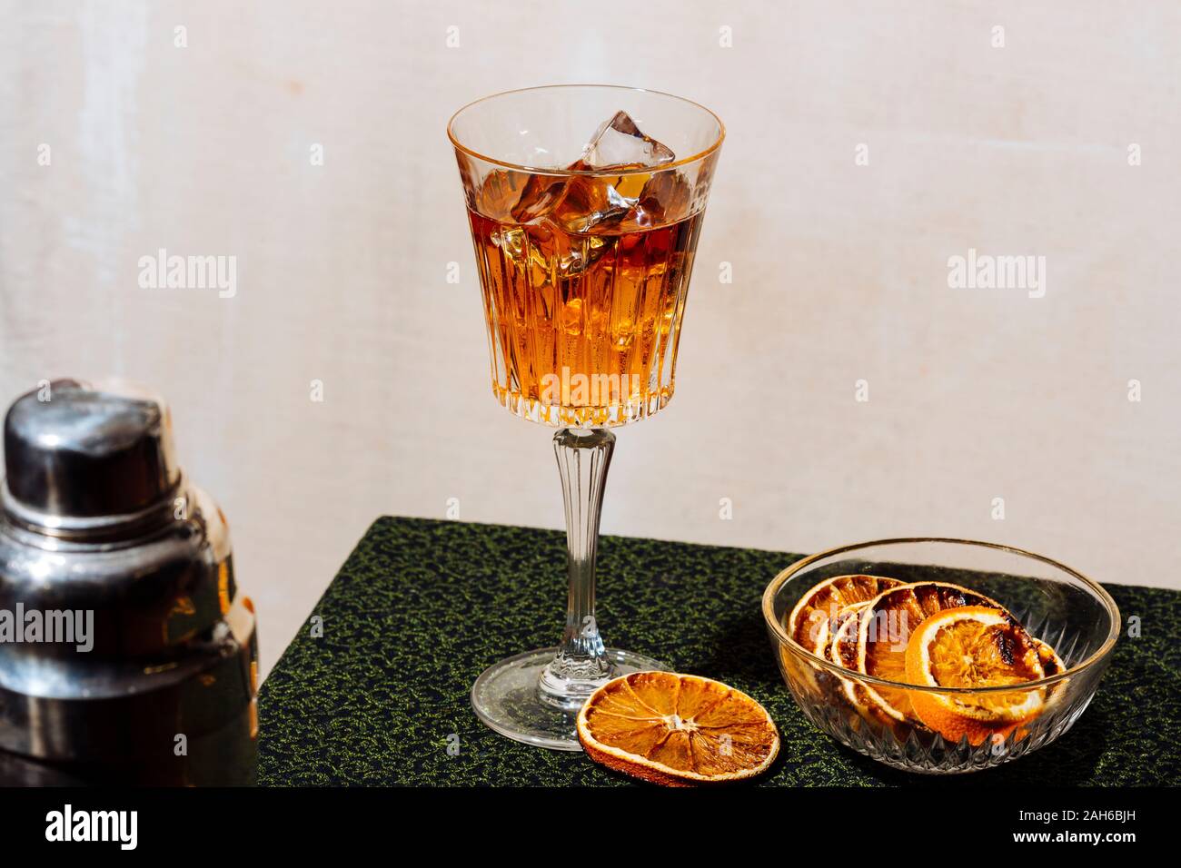 Bitter, ice and charred orange, an italian aperitif Stock Photo - Alamy