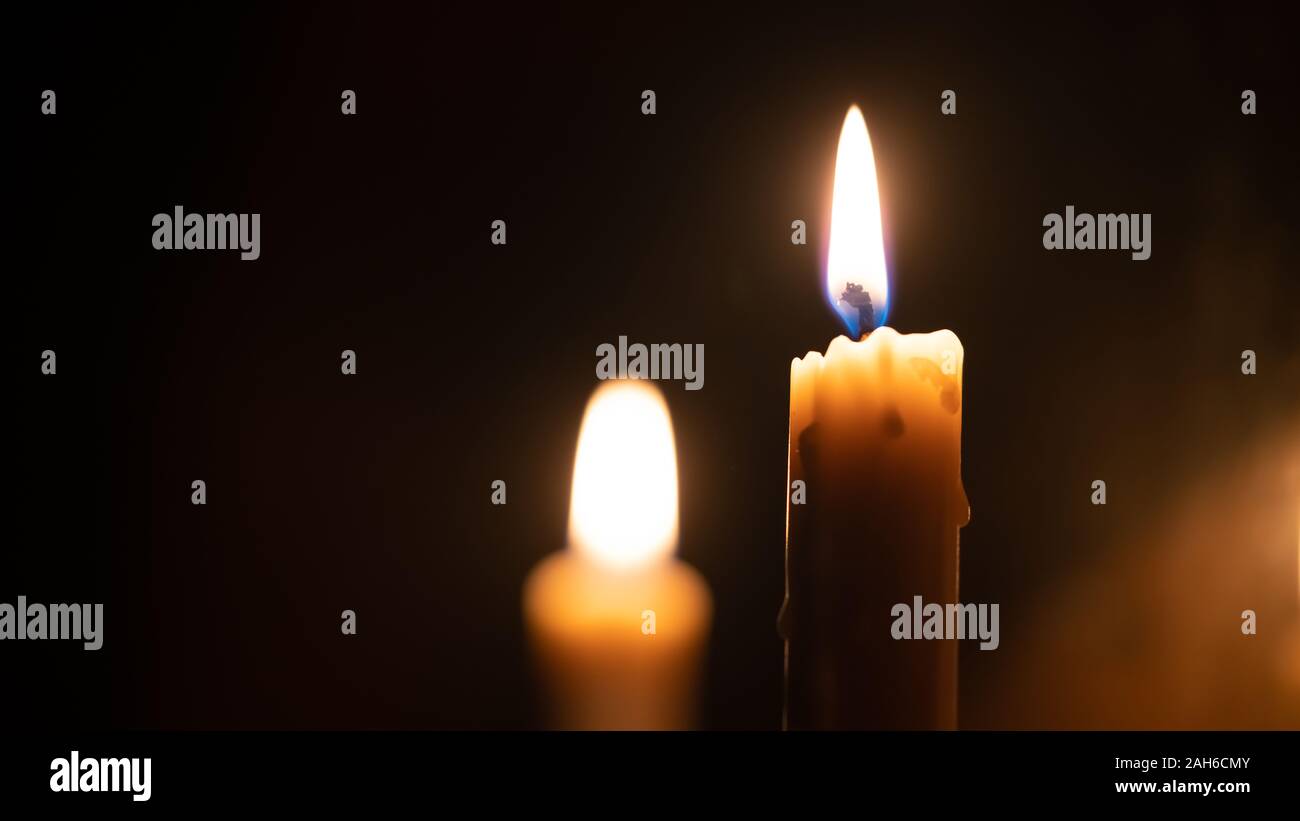 close up candle light in the dark macro photography texture background ...