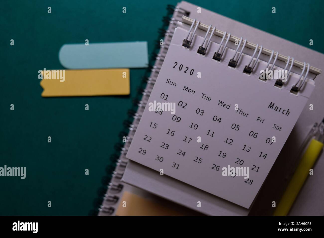 White Calendar march 2020 on office desk background Stock Photo - Alamy