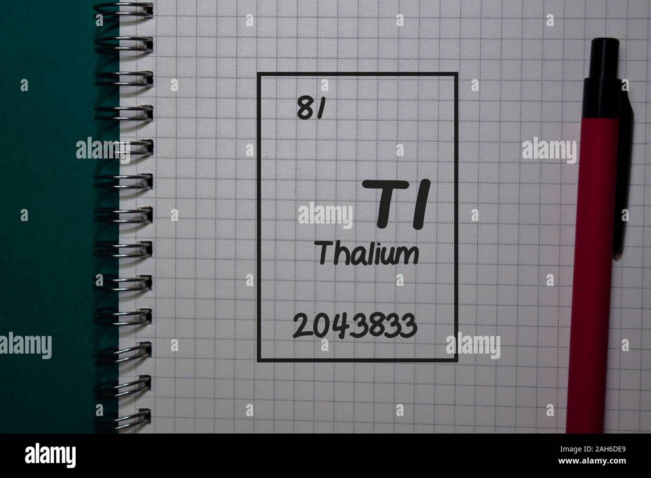 Thallium - TI. write on a book isolated on Office Desk Stock Photo - Alamy