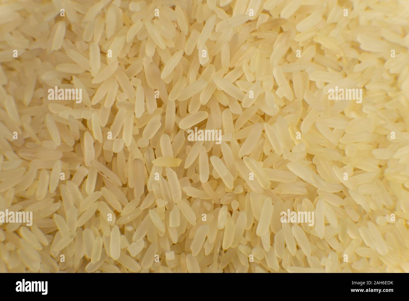 Long grain white rice background. Macro, closeup. Rice texture. Top ...