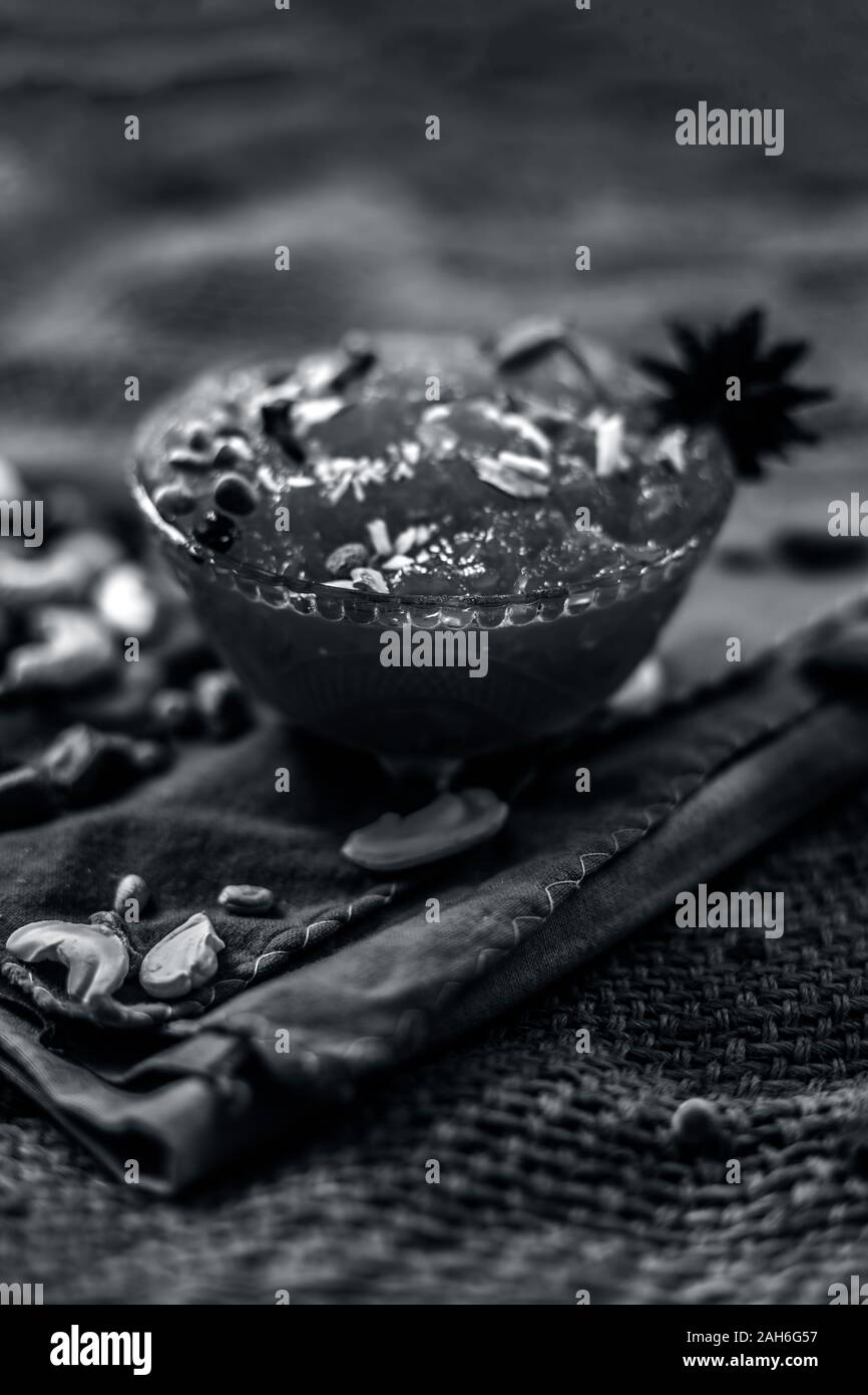 Famous mango preservation i.e. Murba or Murabba in a glass bowl on jute ...