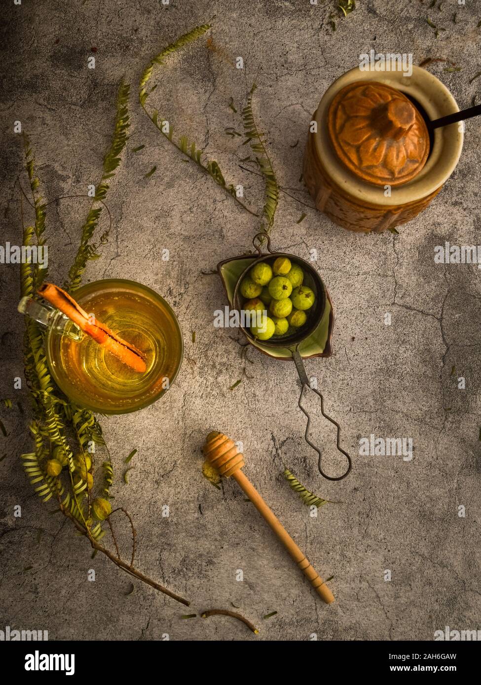 Herbal Gooseberry or Amla Tea with leaves, cinnamon and honey, detox ...