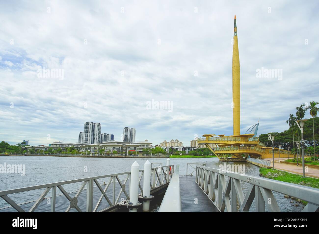 Gold color monument named Millennium Monument in Putrajaya, Malaysia ...