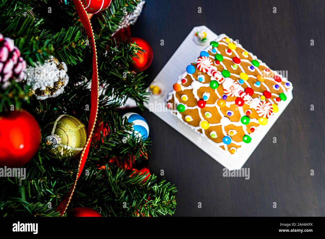 Gingerbread house under tree christmas hi-res stock photography and ...
