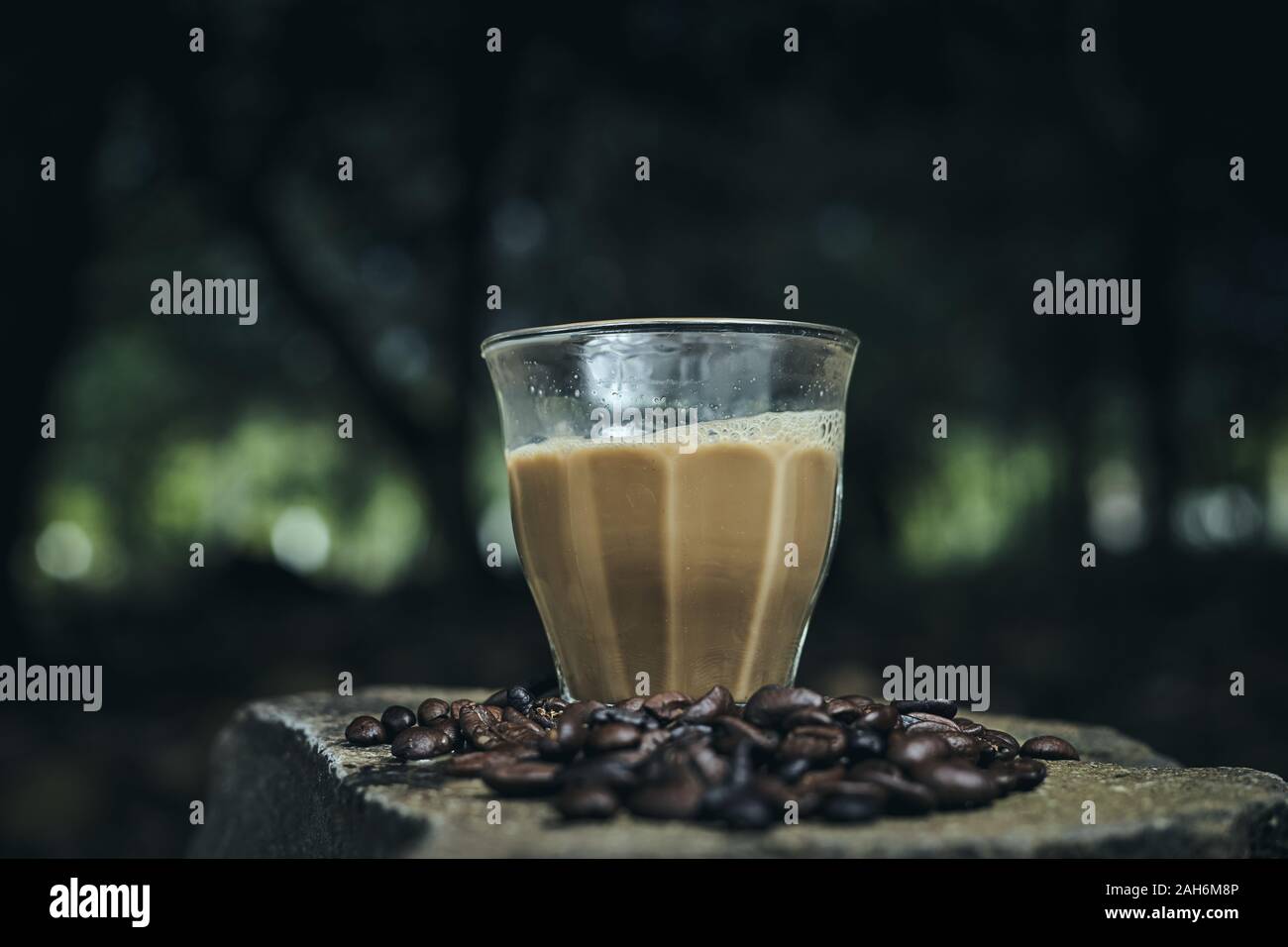 A glass of Coffee Latte with Natural background Stock Photo - Alamy