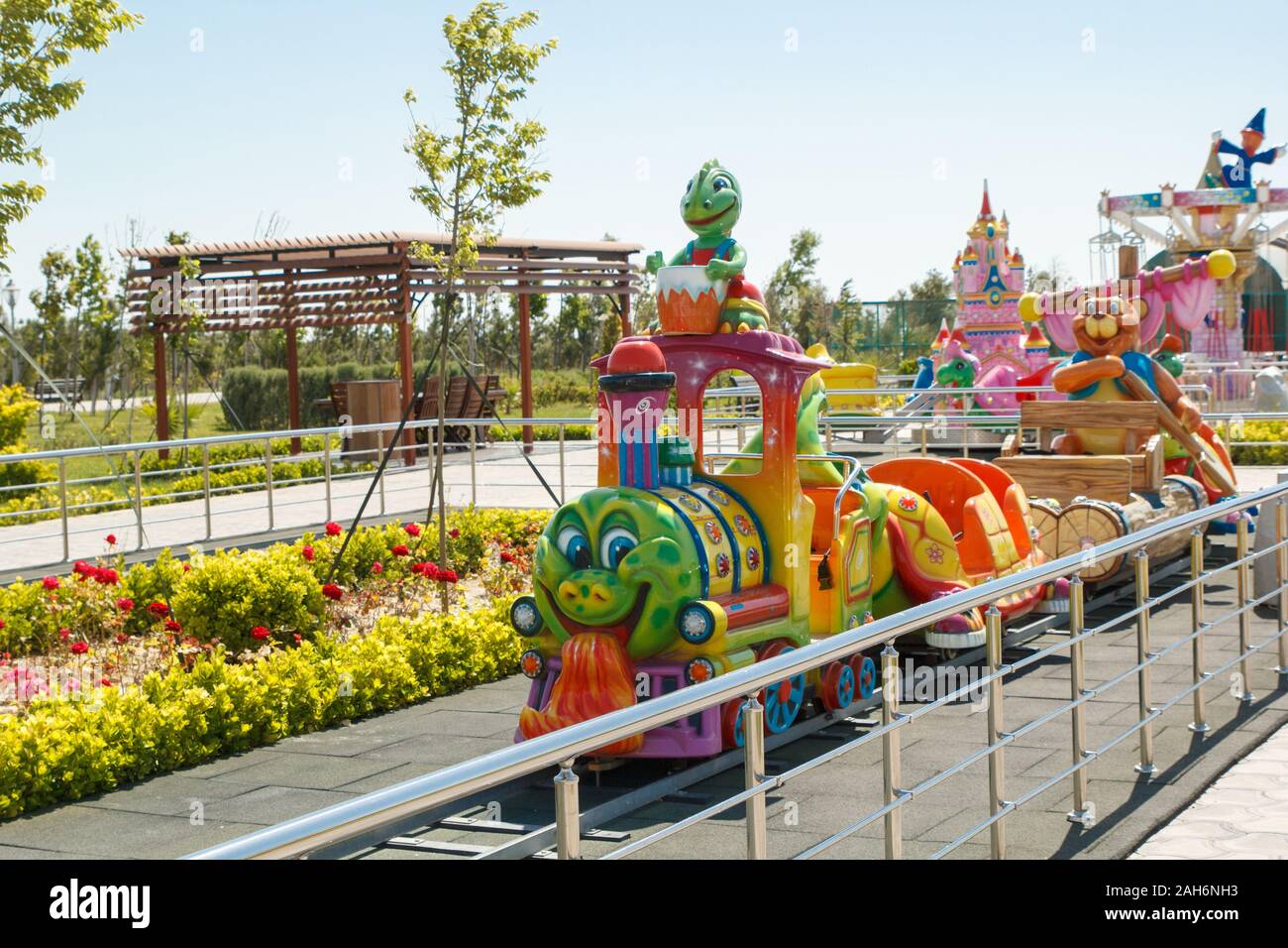 Amusement kids park with swings and wooden pergola in a sunny day Stock ...