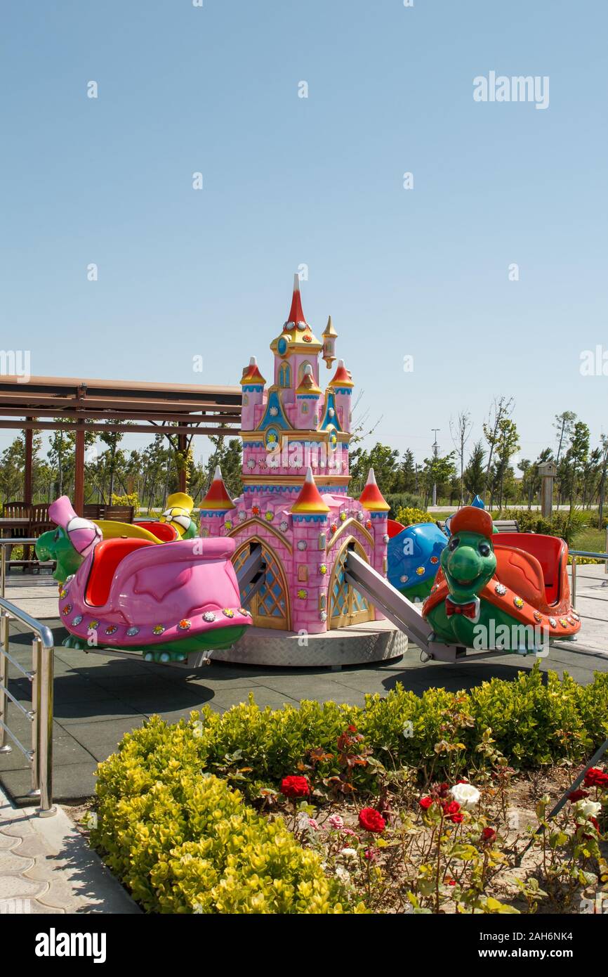 Pink castle in amusement park in sunny day Stock Photo - Alamy