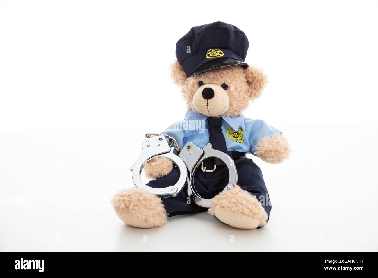 Police and arrest concept. Cute teddy bear in police officer uniform ...