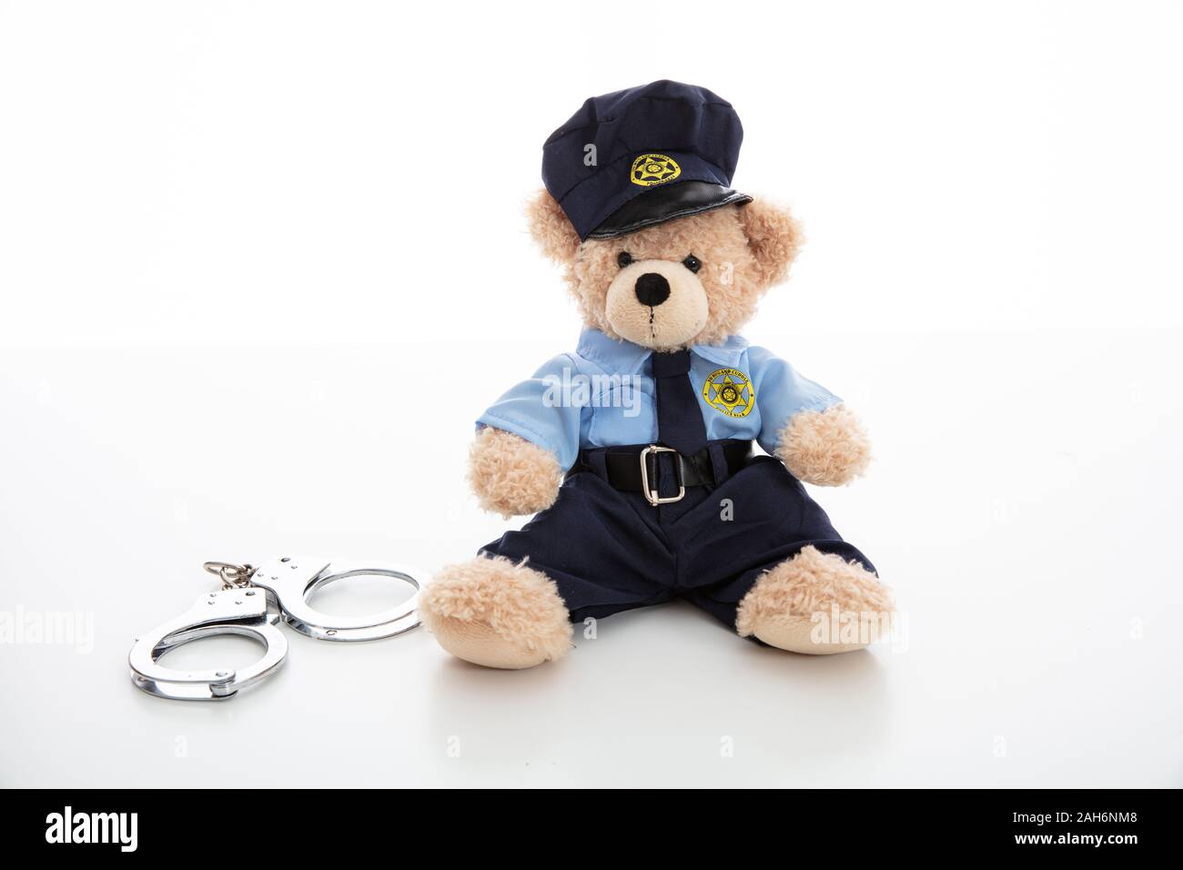 Police and arrest concept. Cute teddy bear in police officer uniform ...