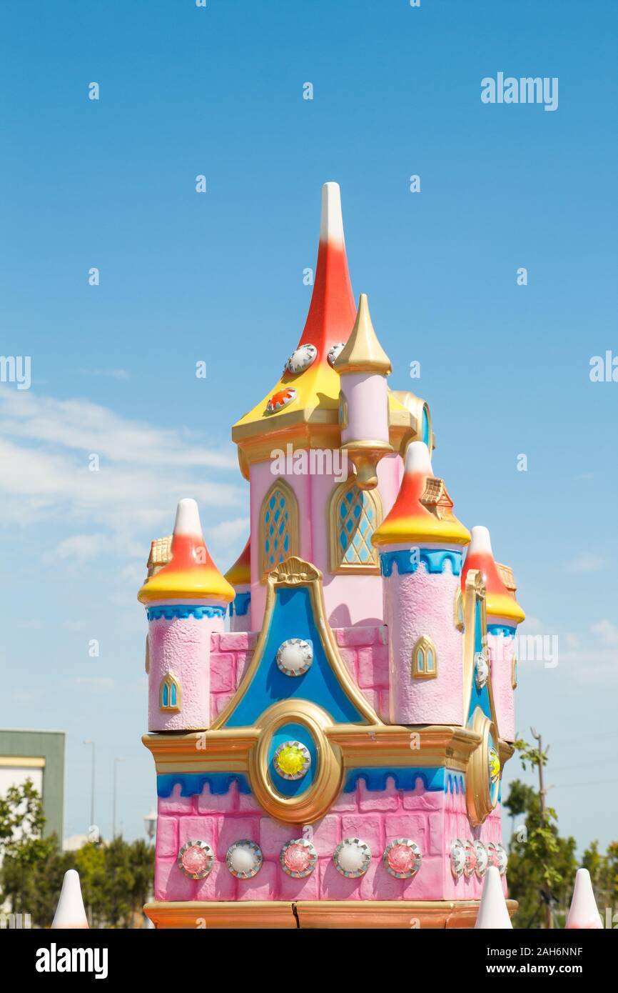 Pink castle in amusement park in sunny day Stock Photo - Alamy