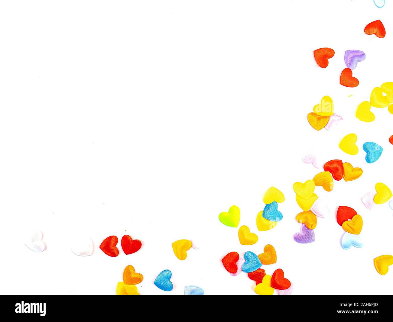Multi-colored hearts on a white background for Valentine's Day with a ...