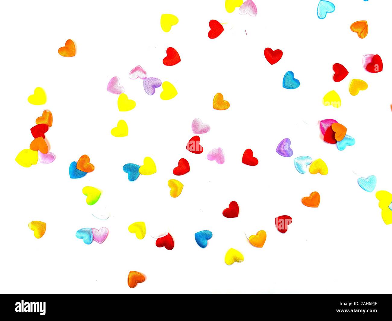 Multi-colored hearts on a white background for Valentine's Day with a ...