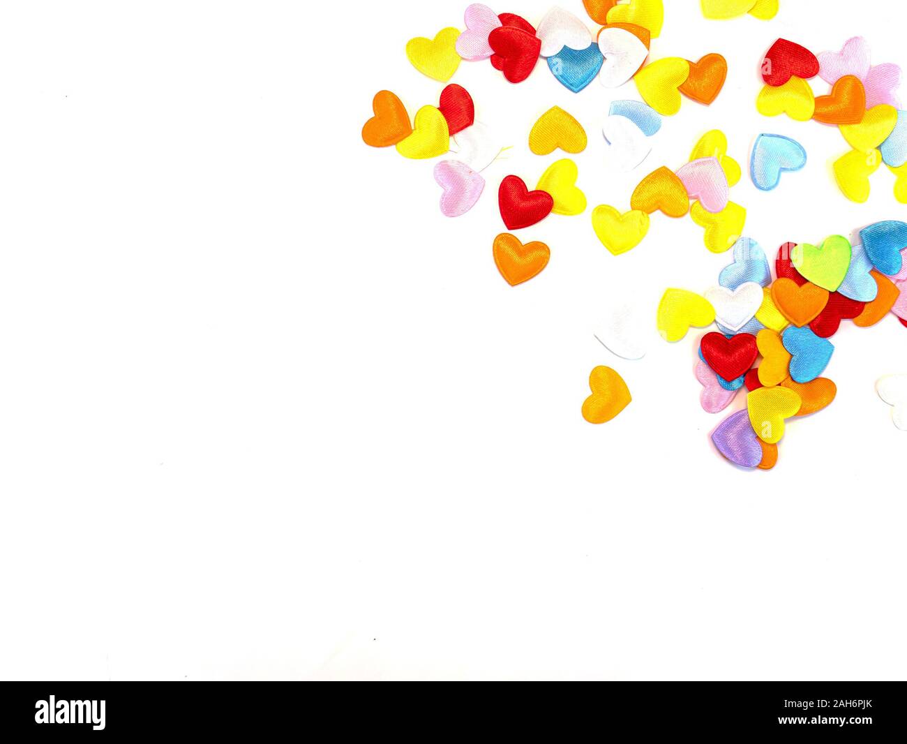 Multi-colored hearts on a white background for Valentine's Day with a ...