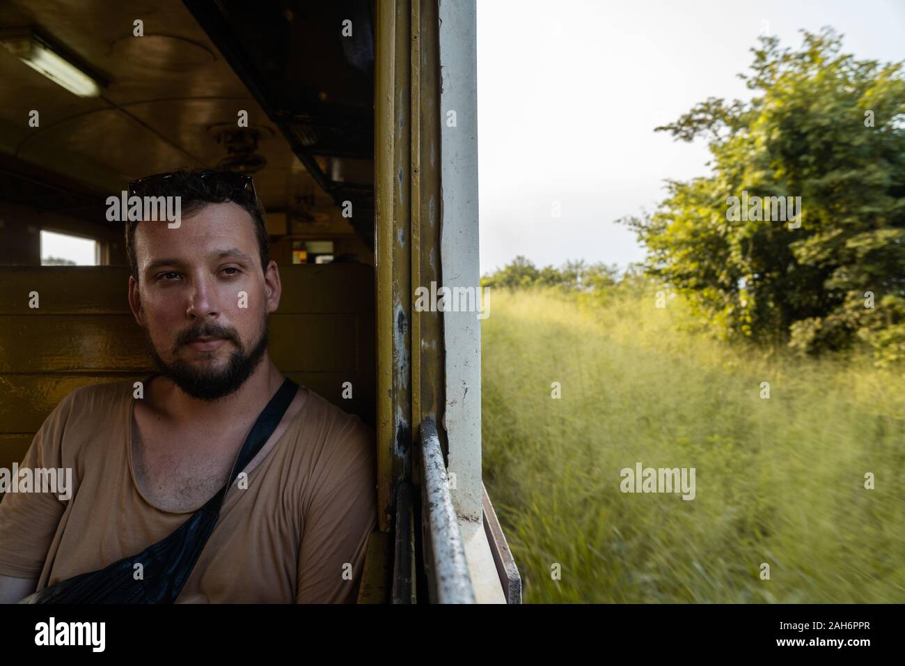 Happy traveler sitting on train hi-res stock photography and images - Alamy