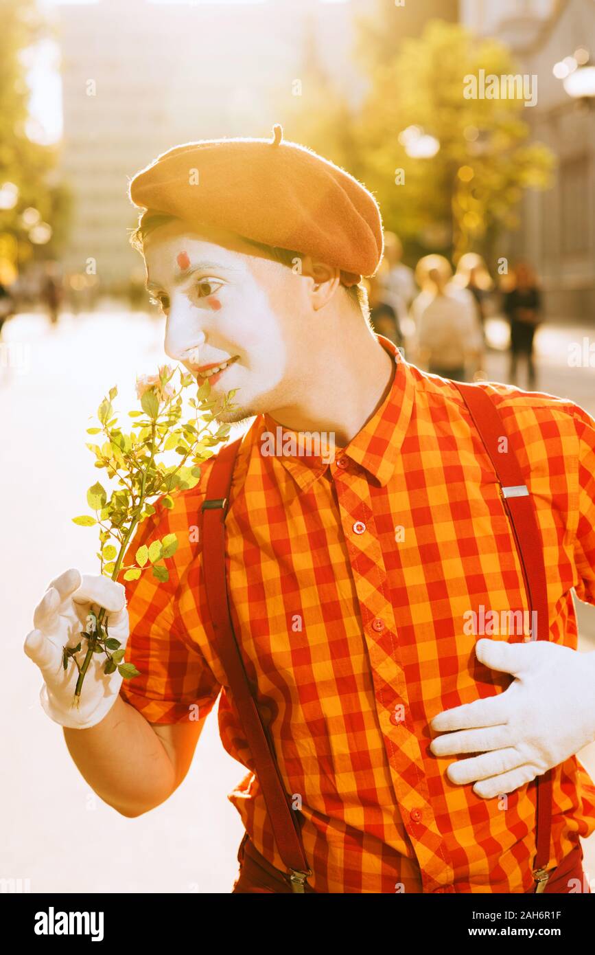 Clown on the street waiting to meet with his lover Stock Photo - Alamy
