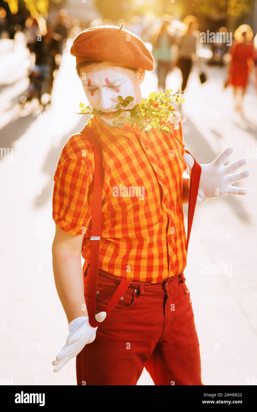 Clown on the street waiting to meet with his lover Stock Photo - Alamy