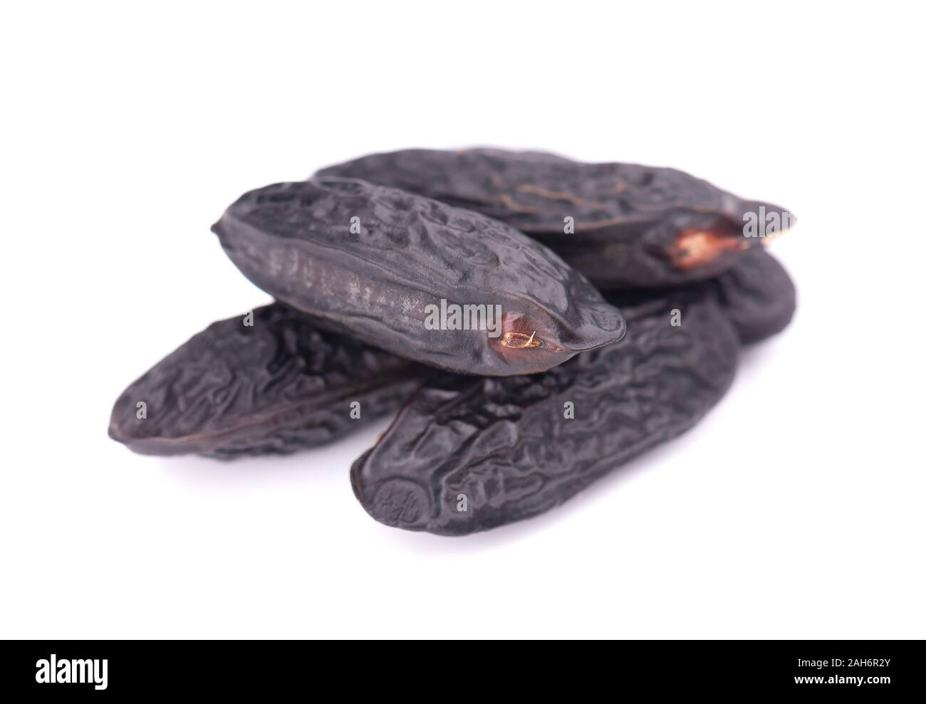 Tonka beans isolated on white background. Bean of Dipteryx odorata ...