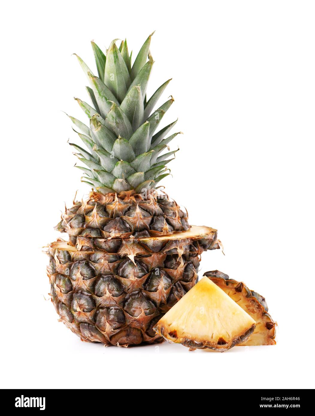 Pineapple isolated. One whole pineapple with green leaves isolated on ...