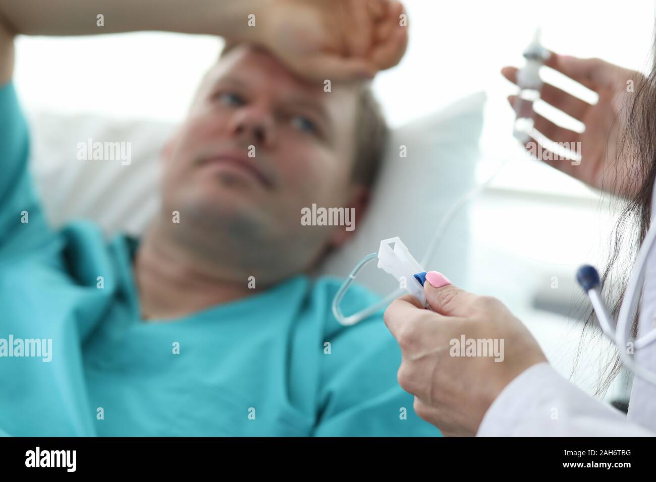 Ill patient treating in hospital Stock Photo - Alamy