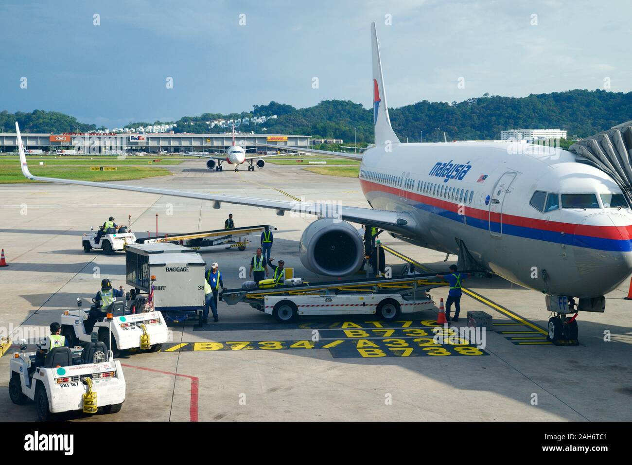 Malaysian Airlines (MAS) aircraft docking at Penang International ...