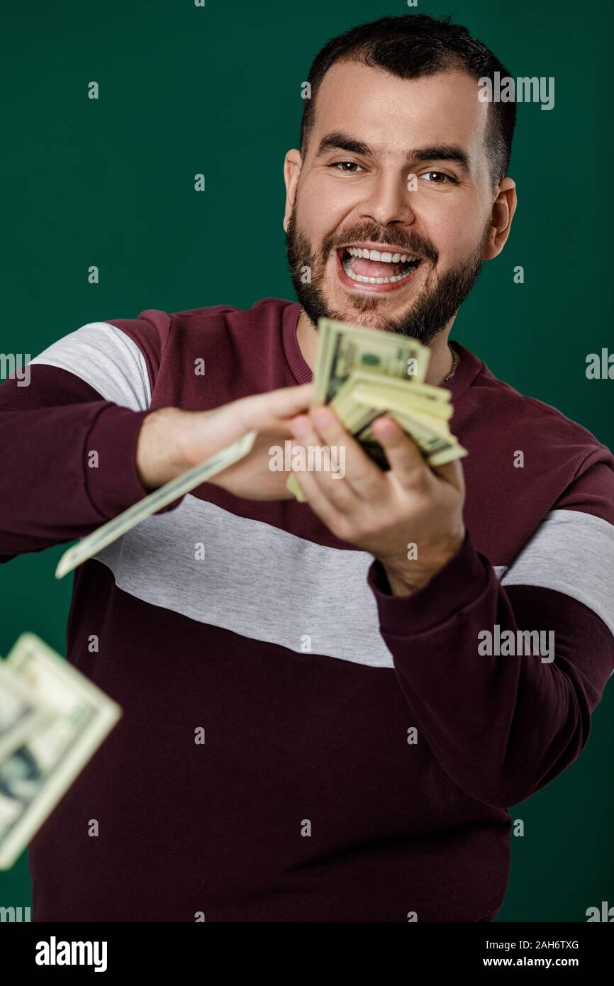 Happy rich man throwing money hi-res stock photography and images - Alamy
