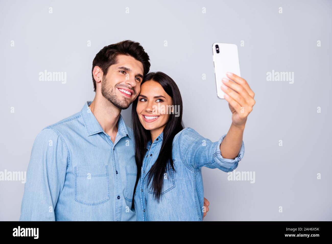 Photo of cheerful trendy charming cute nice couple of two people taking ...