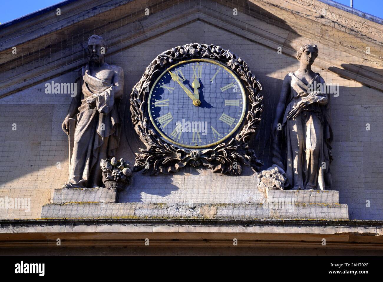 The clock on the front of the old Town Hall in Tewkesbury, a Cotswolds ...