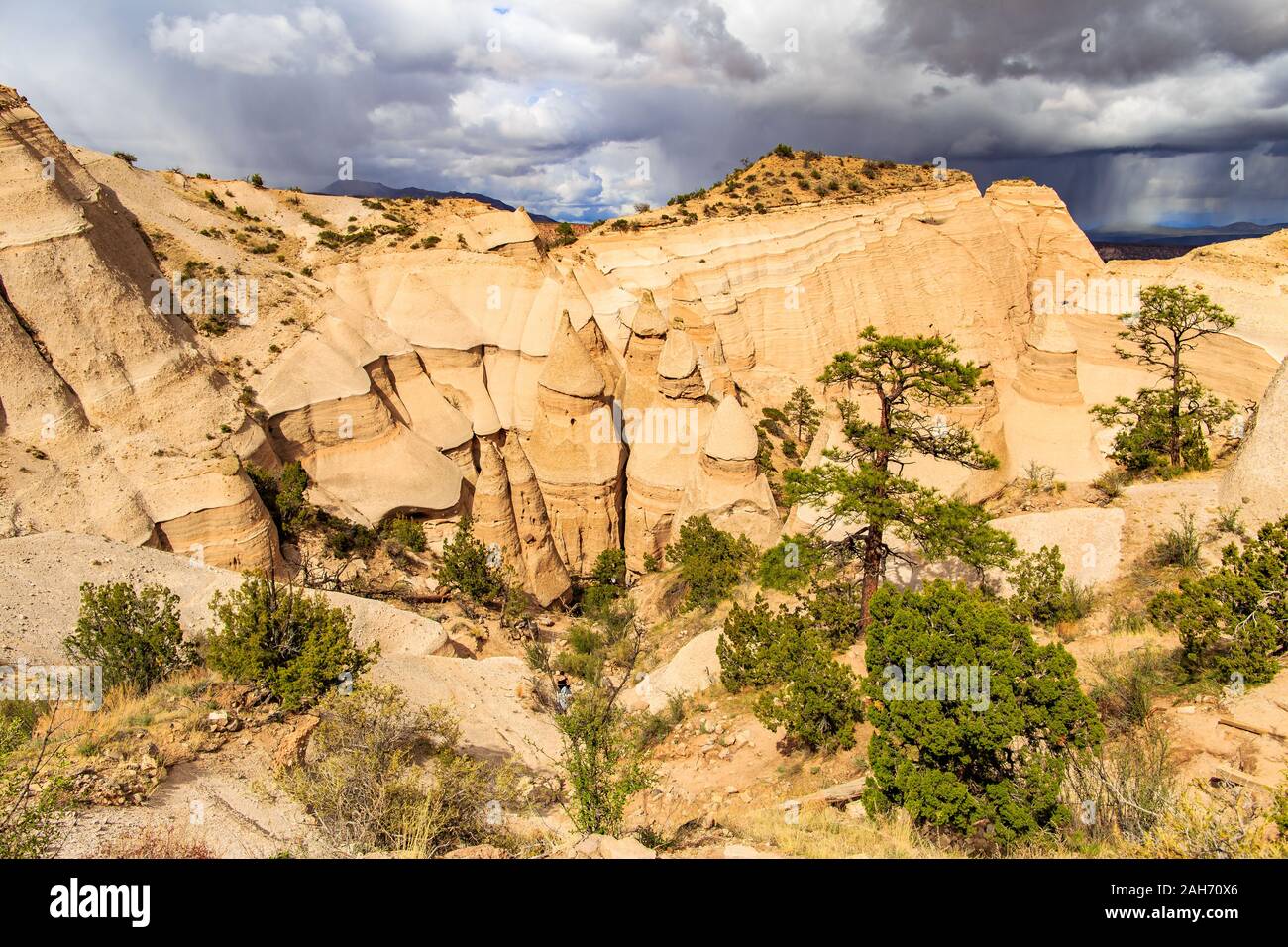Landscape of rock formations against dark stormy sky in Kasha-Katuwe ...