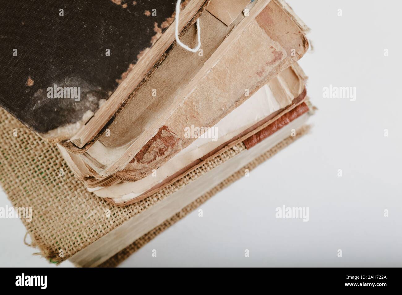 a ragged old rare book with many pages Stock Photo - Alamy