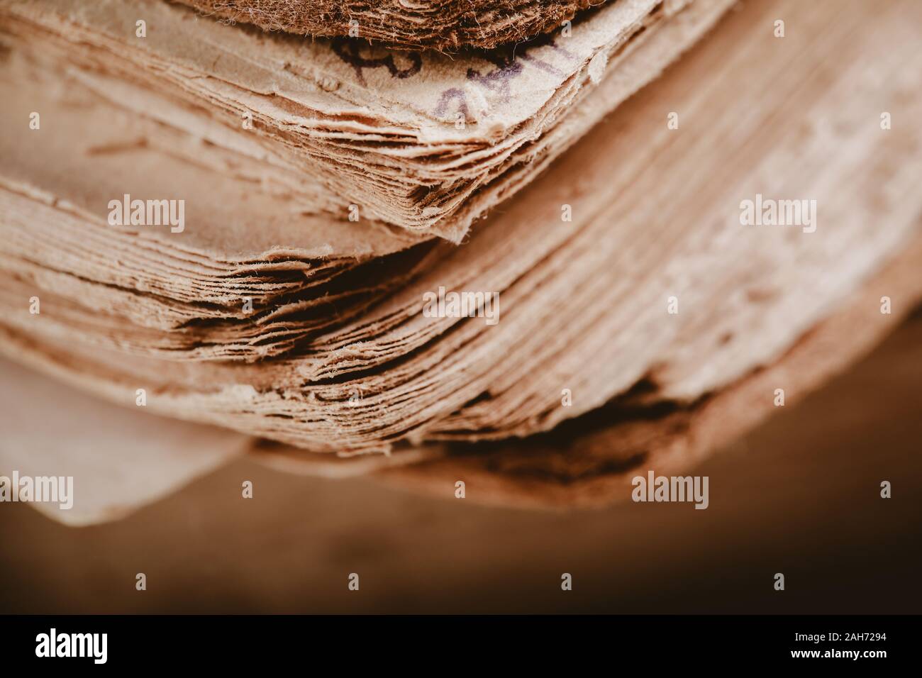 a ragged old rare book with many pages Stock Photo - Alamy