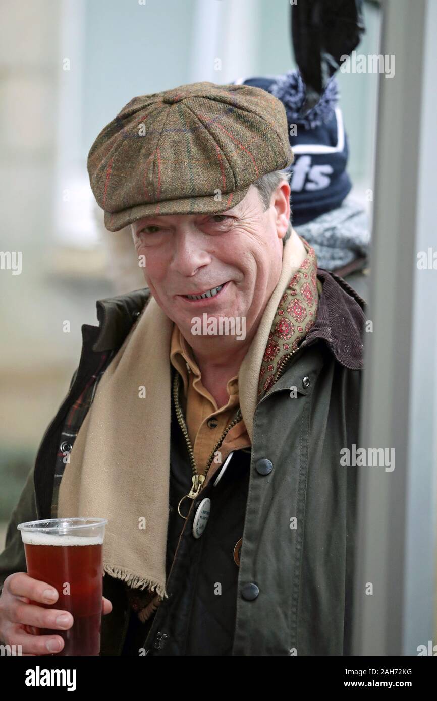 Nigel Farage enjoys a pint before the Old Surrey Burstow and West Kent ...