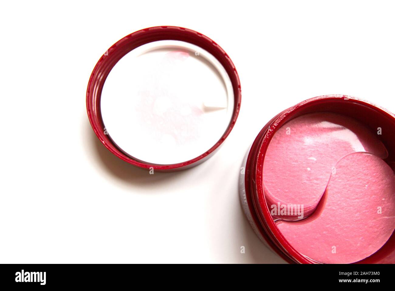 Cosmetic eye patches in a jar on a white background. Face skin care ...