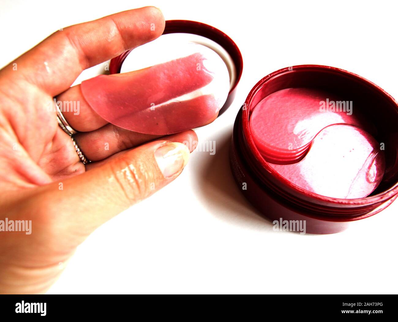 Cosmetic eye patches in a jar on a white background. Face skin care ...