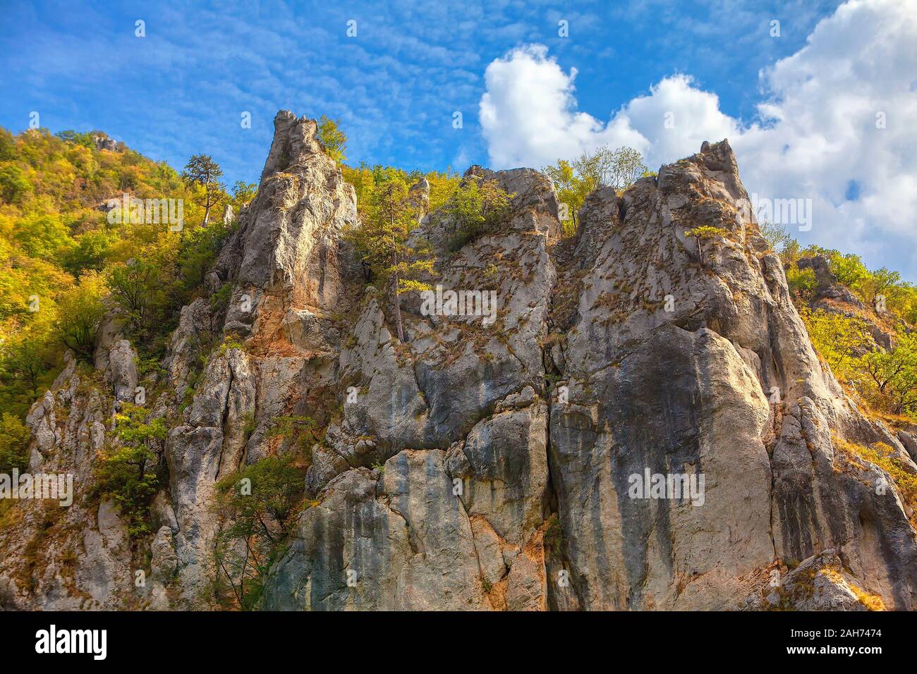 scenery of steep rocky cliff Stock Photo - Alamy