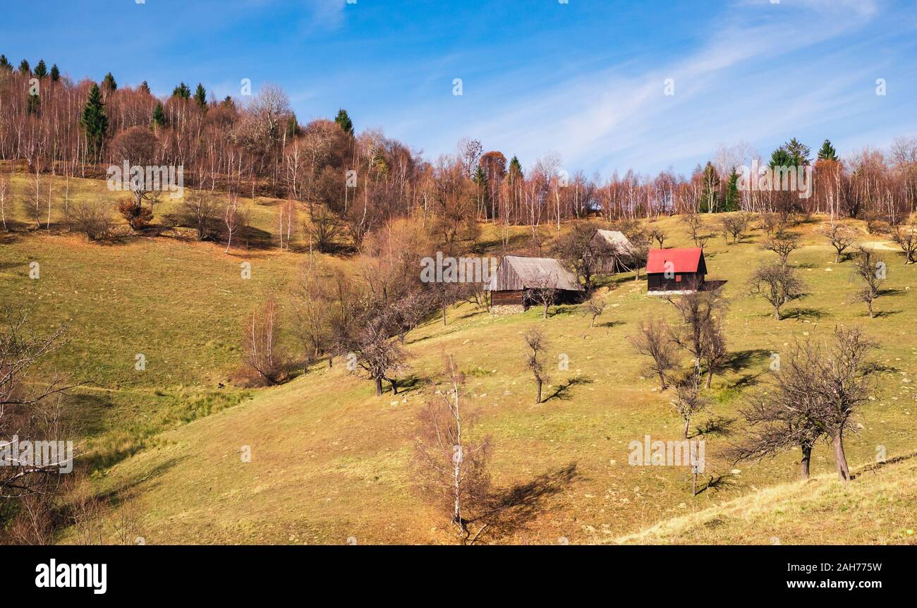 Romanian old sheepfold on the top of the hill in the fall season ...